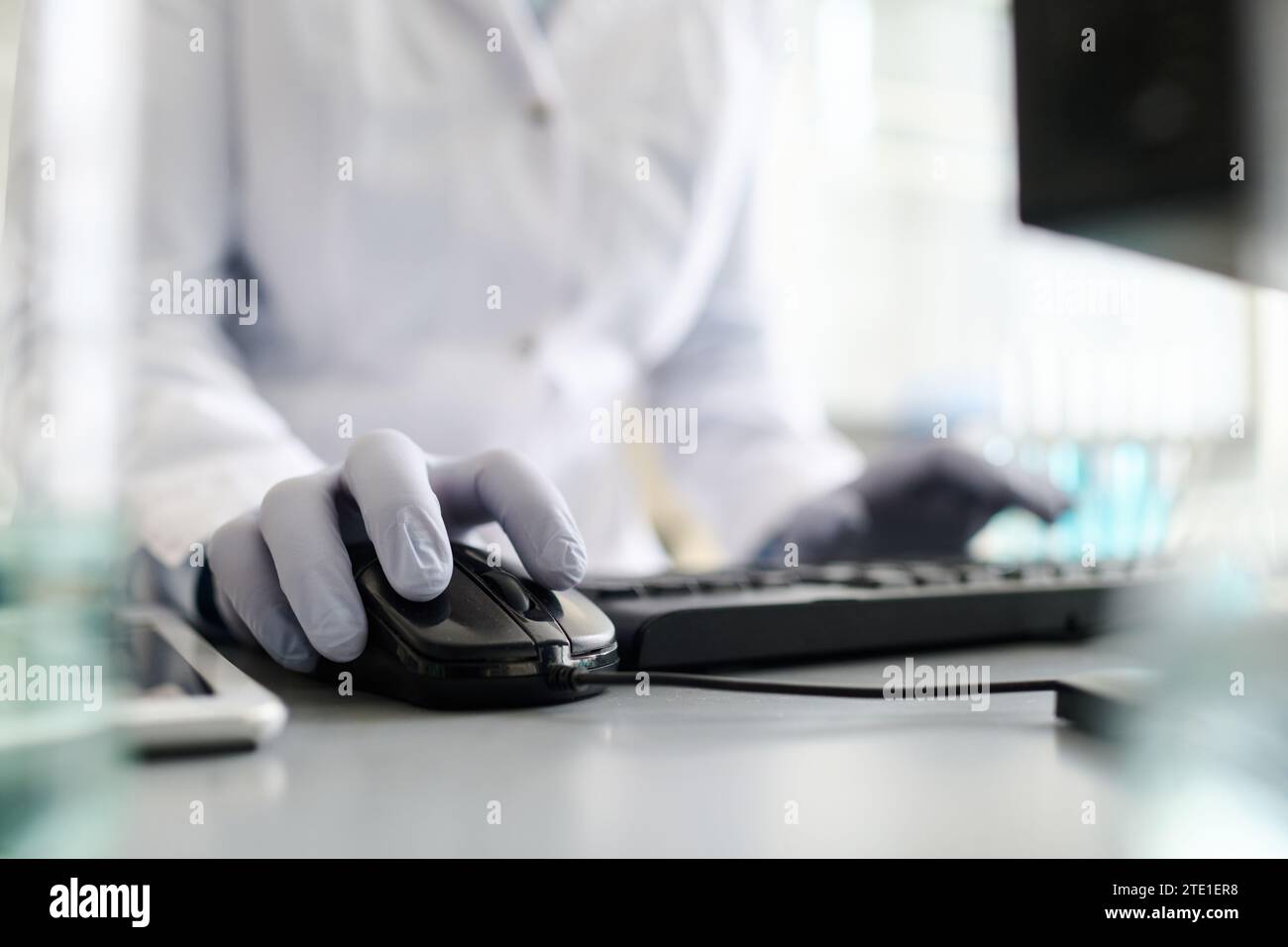 Laboratory Employee Using Computer Stock Photo - Alamy