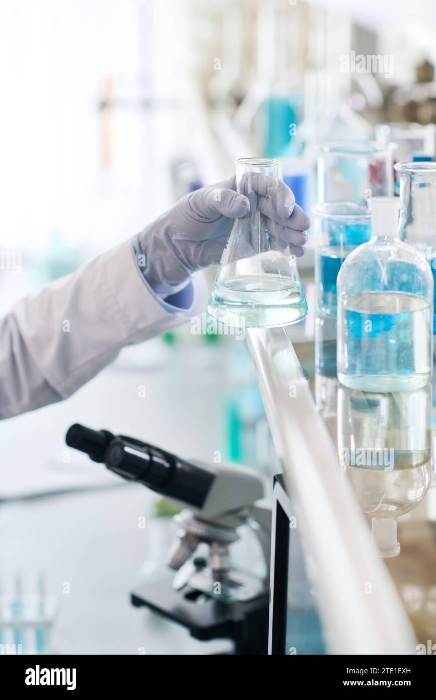 Laboratory Worker Holding Medical Flask Stock Photo - Alamy