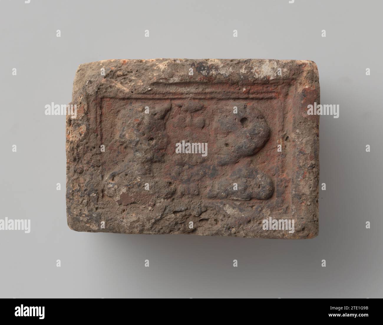 Hearing stone with representation of a men's and women's head from the ...