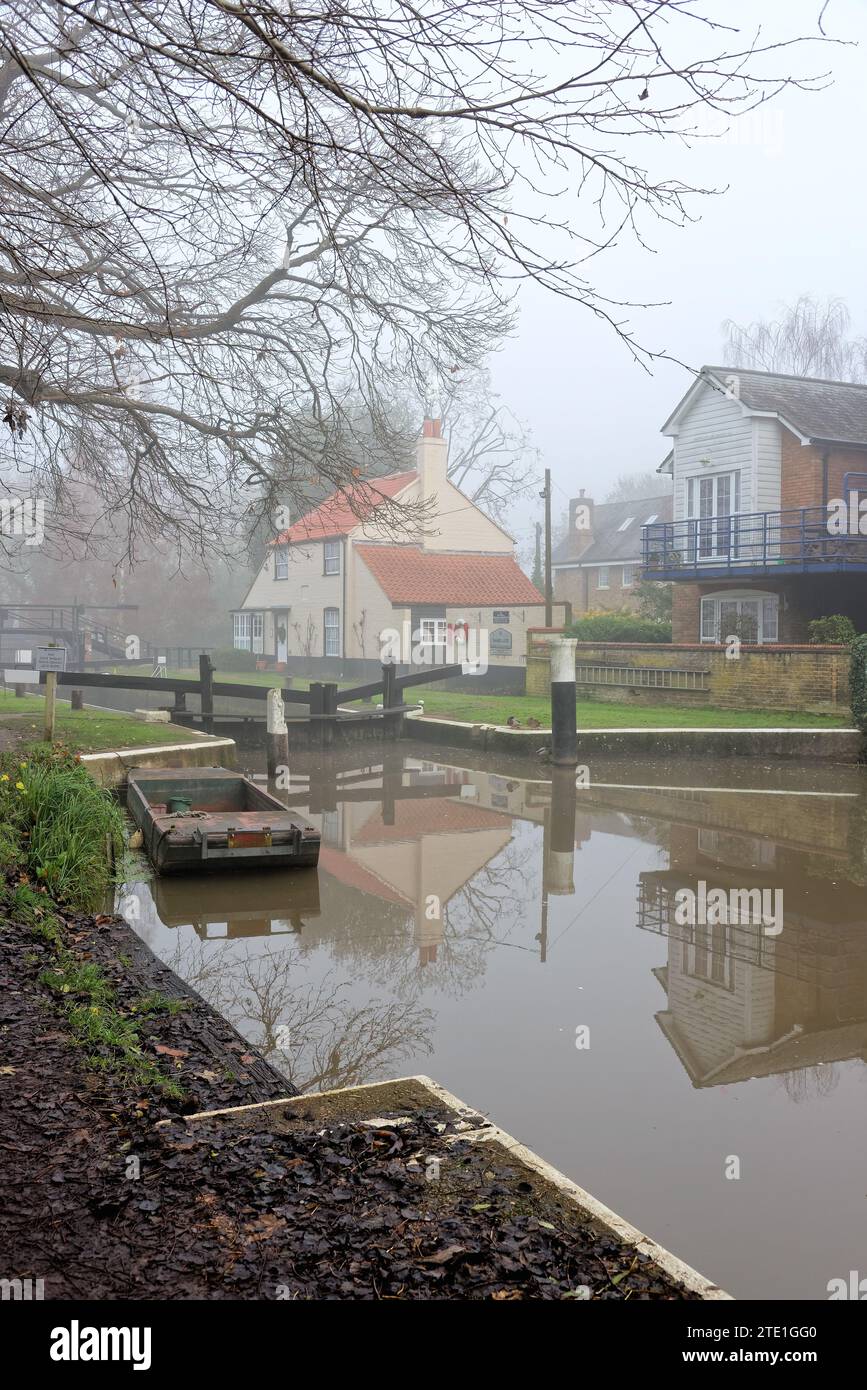 The River Wey navigation canal at Thames lock on a very foggy and misty ...