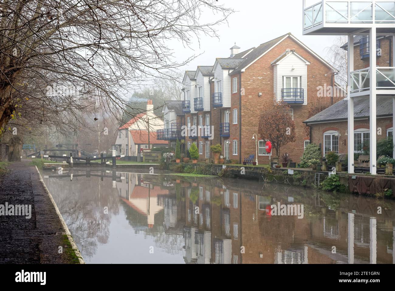The River Wey navigation canal at Thames lock on a very foggy and misty ...