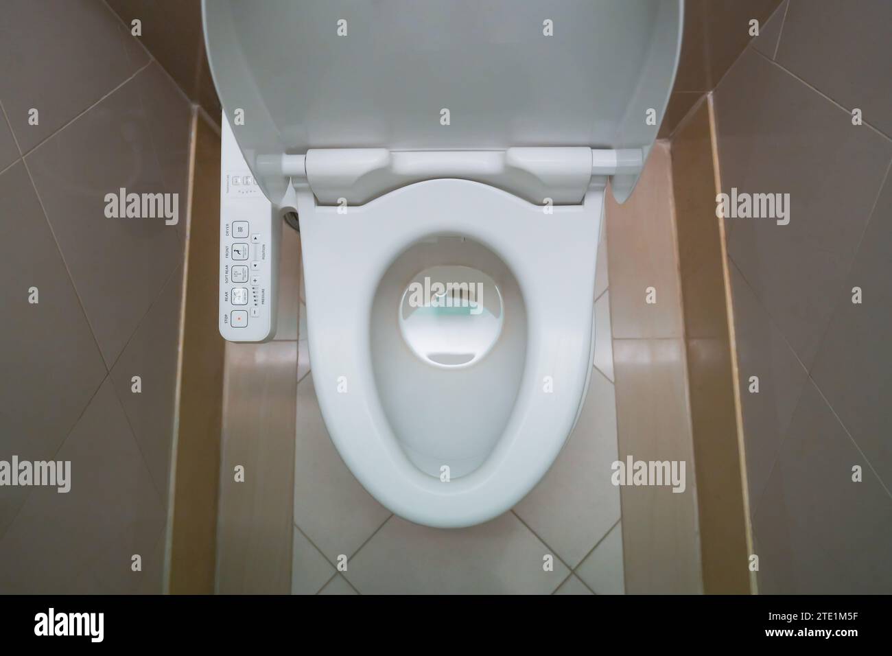 High Tech toilet with automatic bidet installed in public restroom ...