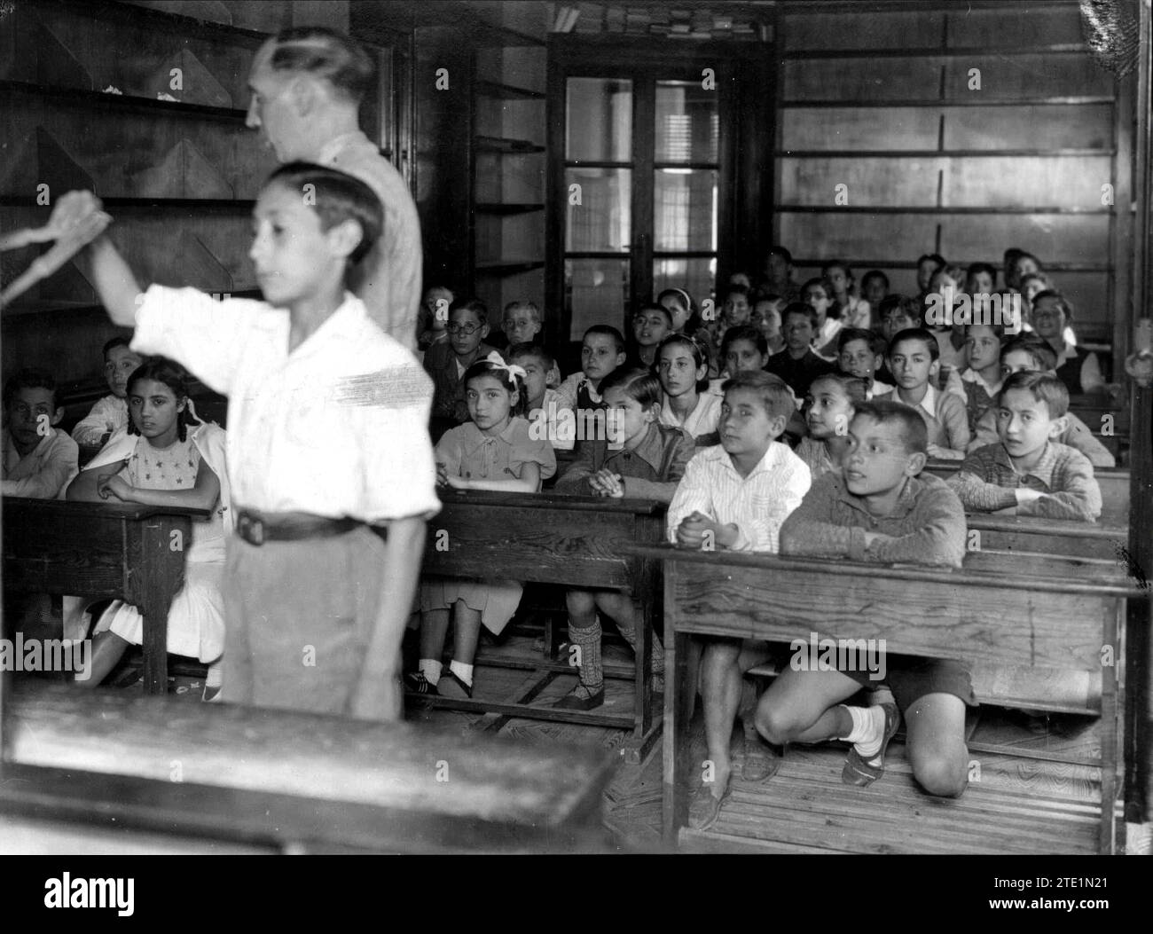 06/01/1938. Class time in the Primary classroom of a school Created by ...