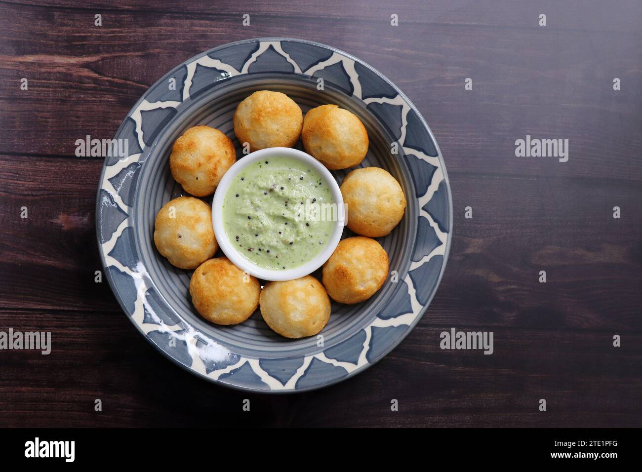 Paniyaram are savory balls made using fermented rice and urad dal ...