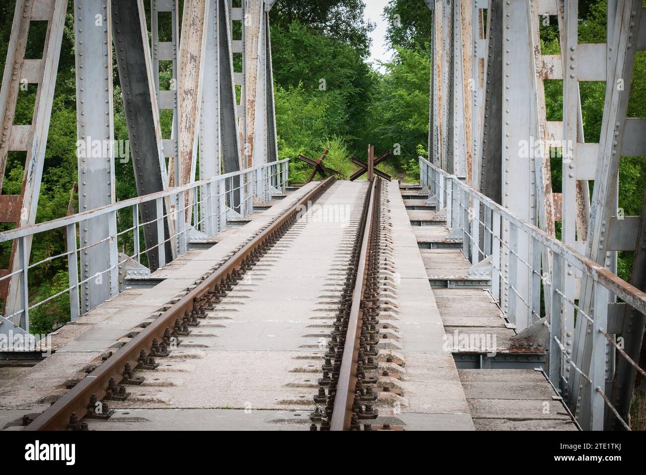 Railway bridge blocked by anti-tank (Czech) hedgehogs Stock Photo - Alamy