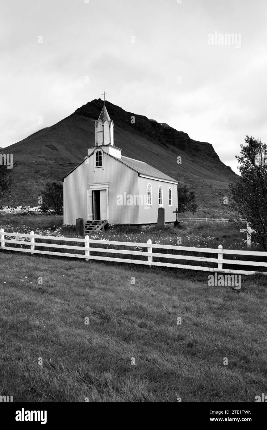 Grey and red church below the Icelandic volcano Stock Photo - Alamy