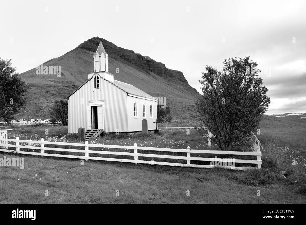 Grey and red church below the Icelandic volcano Stock Photo - Alamy