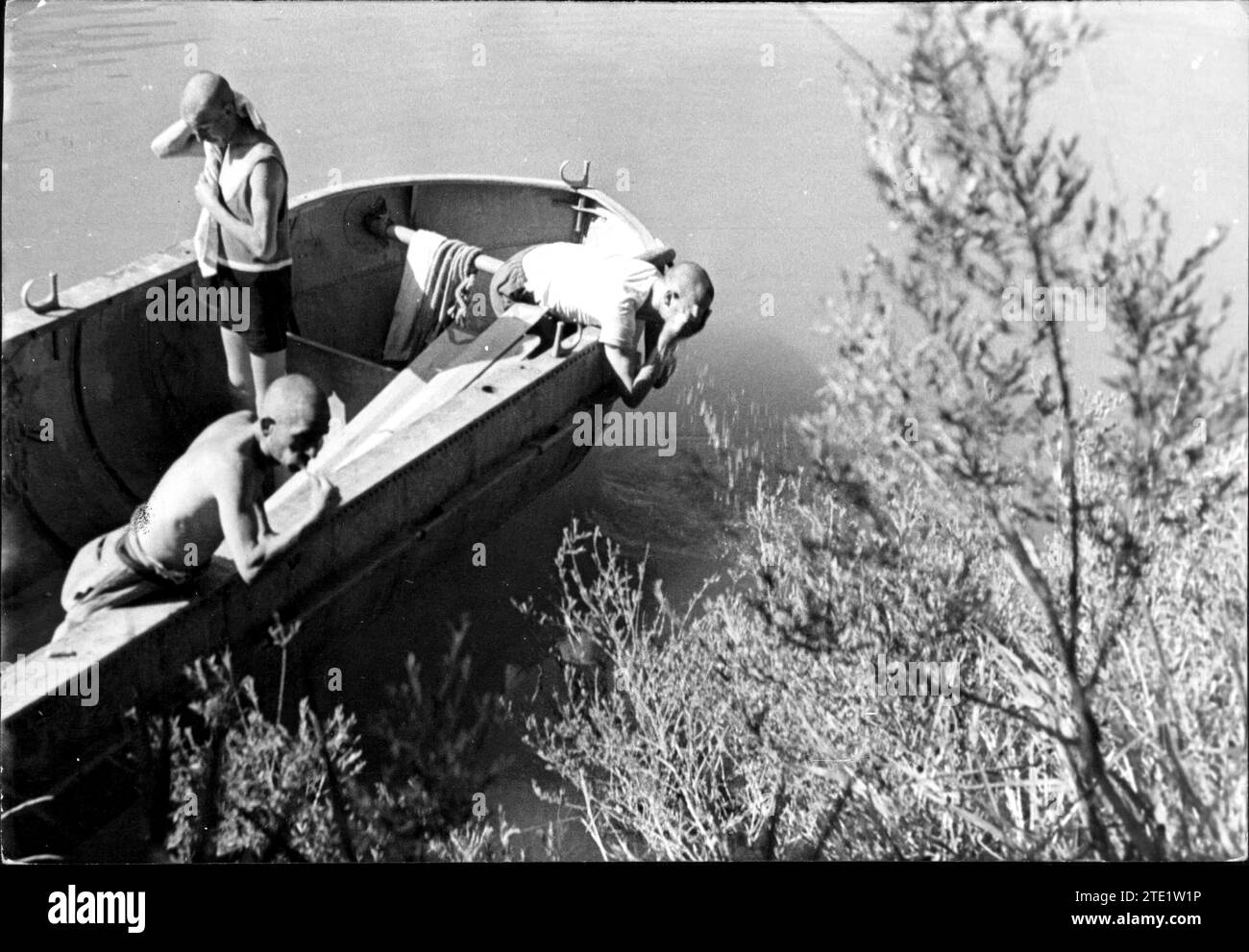 May 1937. Some Republican soldiers wash themselves in a river, during a ...