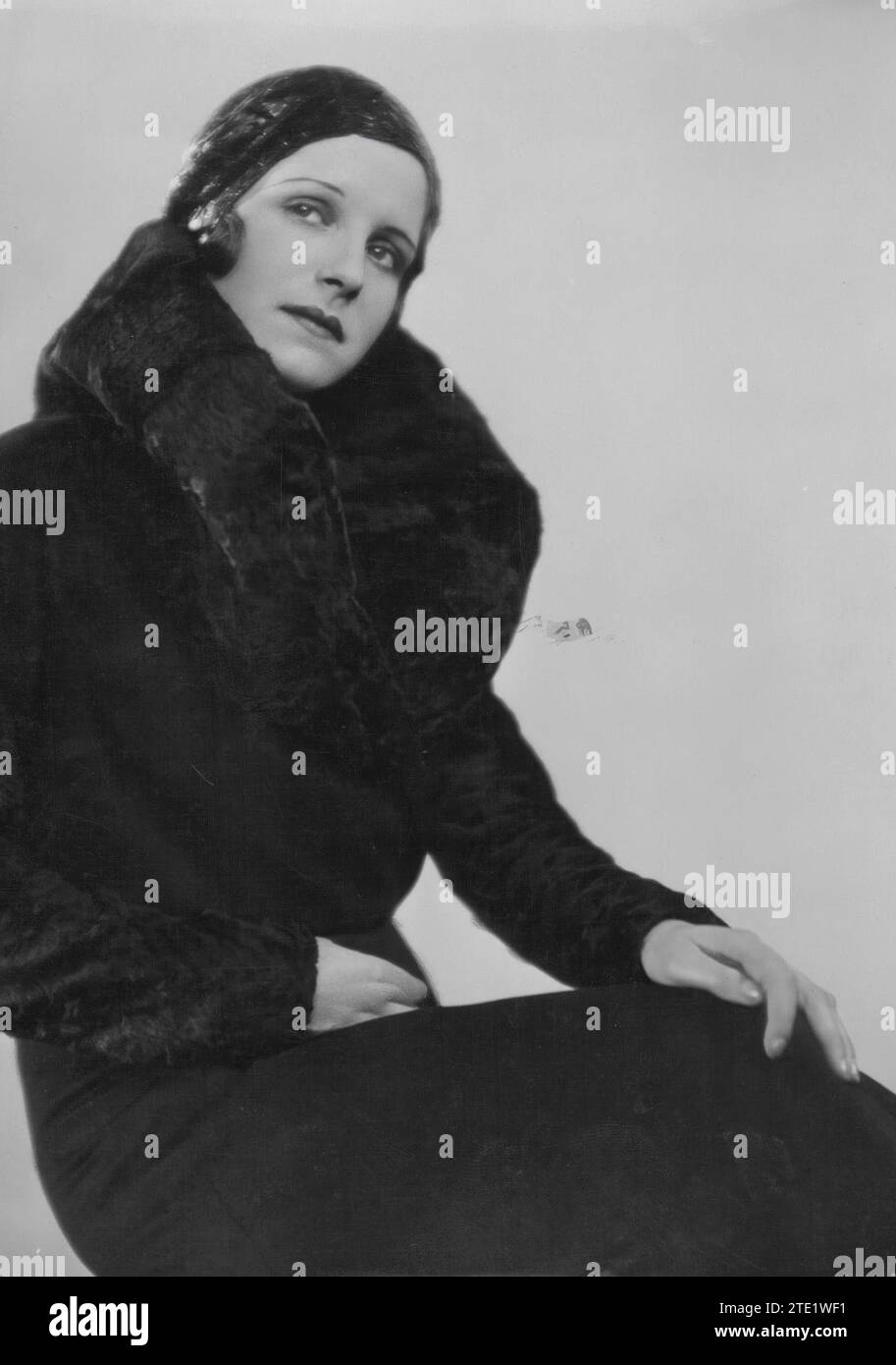 In the Image, a black cloth and foal skin coat. Martial et Armand model ...