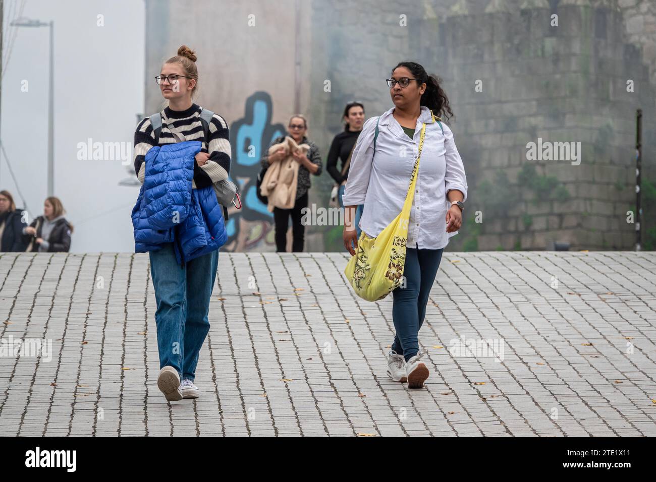 People walking through the streets of Porto Stock Photo - Alamy