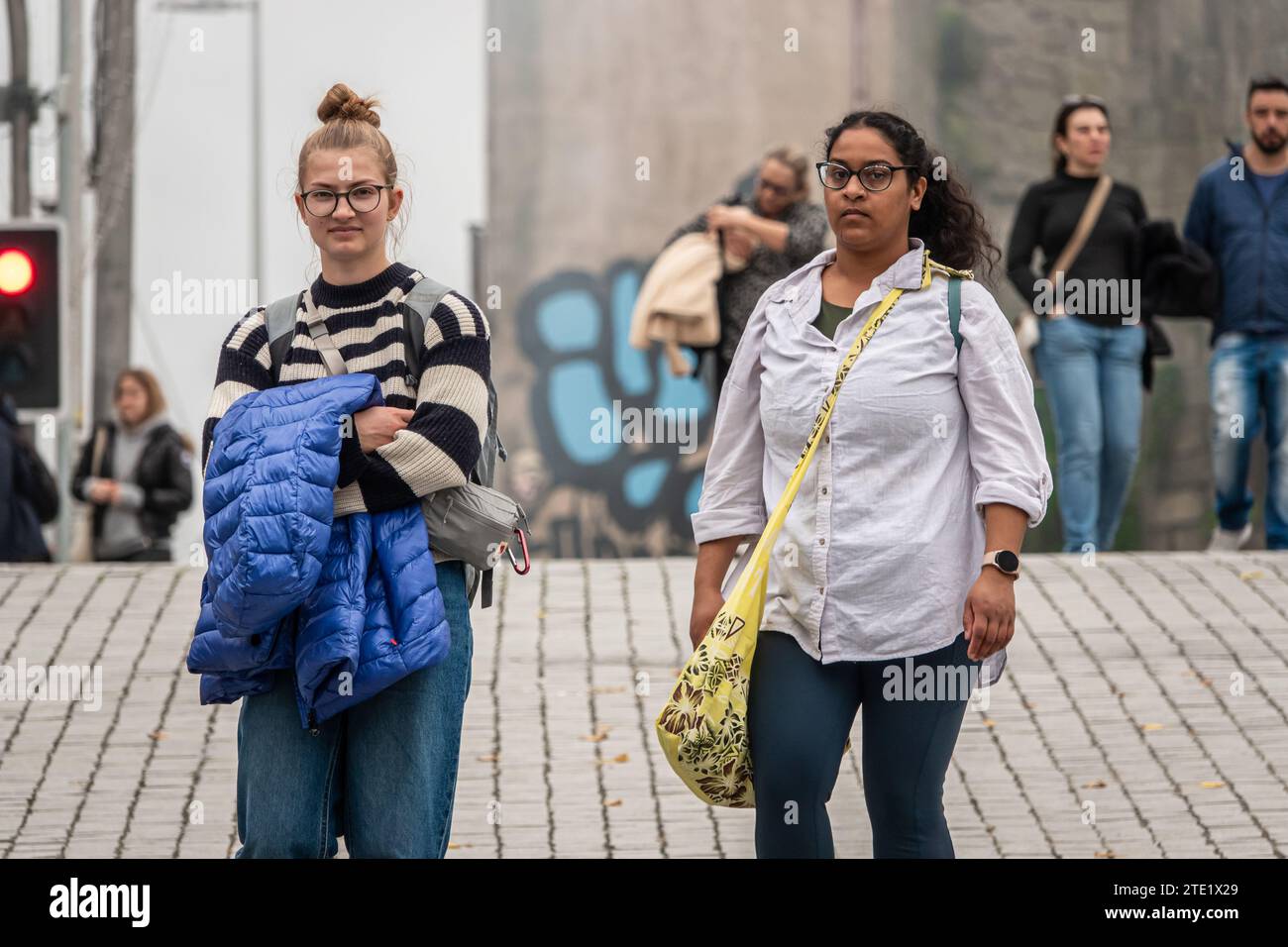 People walking through the streets of Porto Stock Photo - Alamy