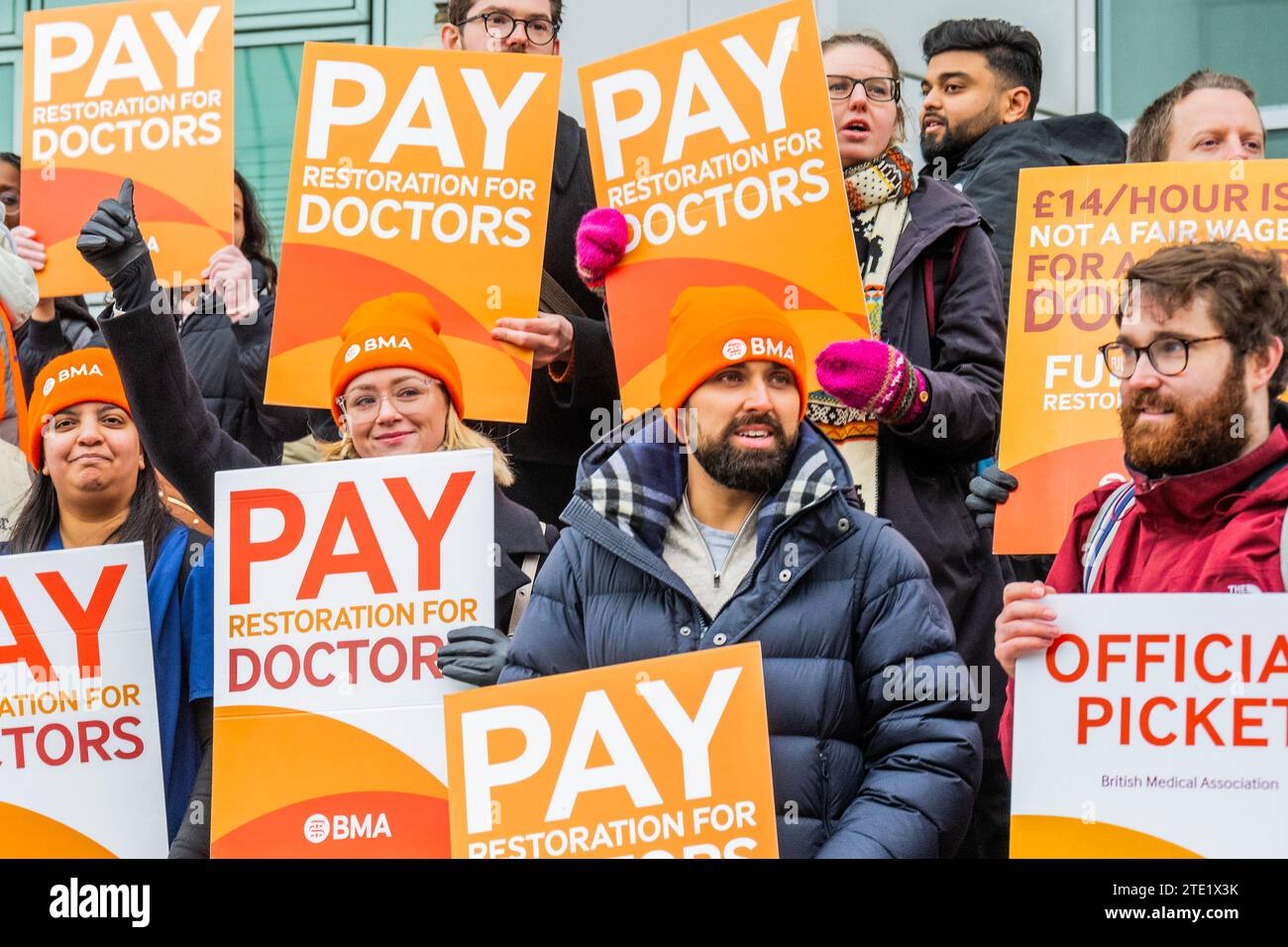 London, UK. 20th Dec, 2023. A picket line outside UCHL thanks cars that ...