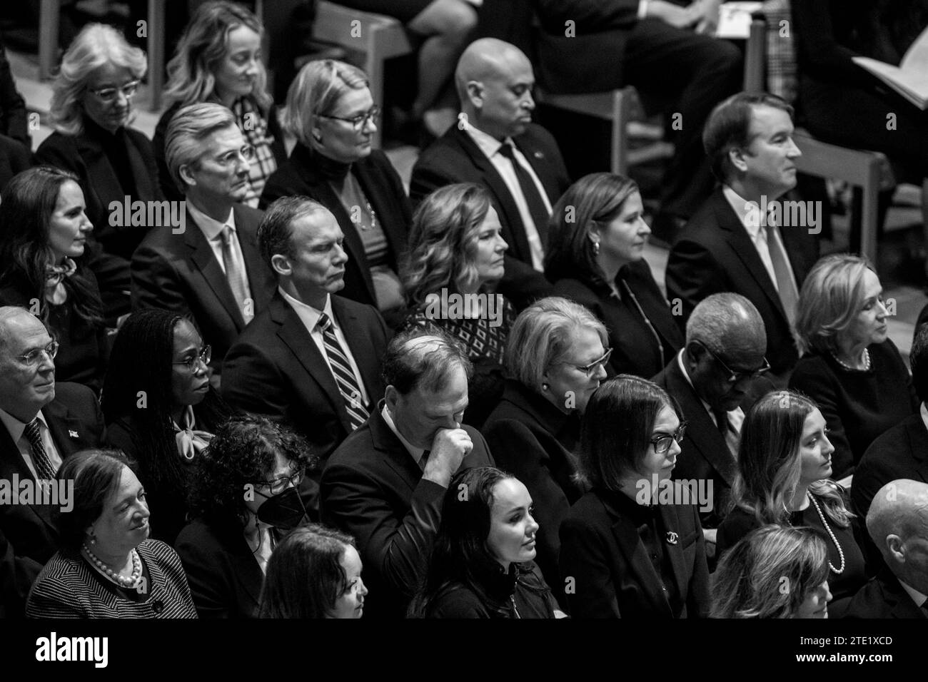 Justice Samuel Alito, Jr., wipes his face during the funeral service ...
