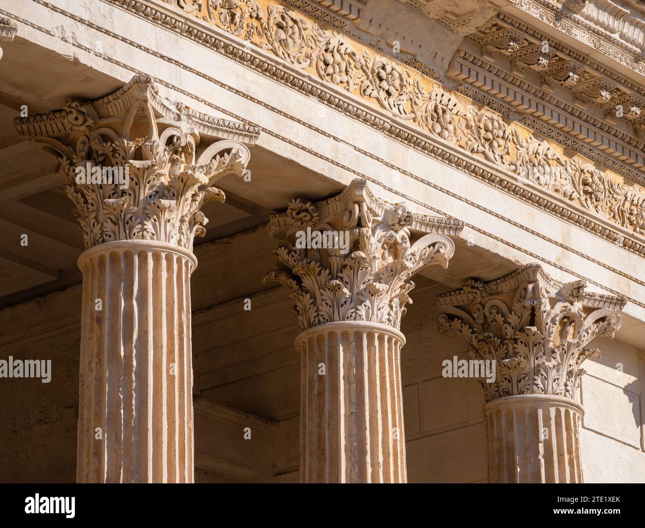 The columns of the antique Roman temple Maison Carree in city of Nimes ...