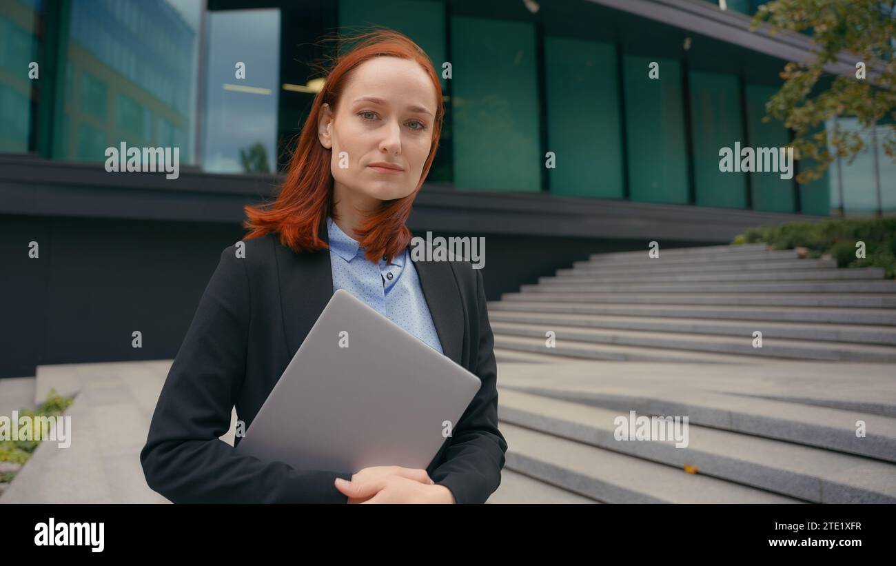 Serious business girl walking in city Caucasian businesswoman walk ...
