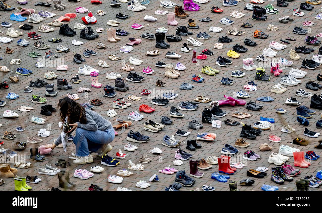 ROTTERDAM - Eight thousand pairs of shoes are displayed on De ...