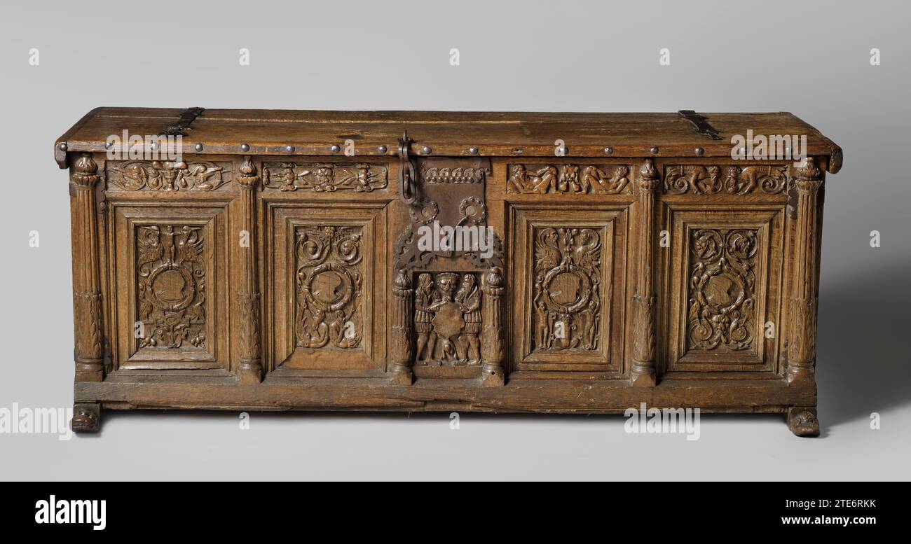 Chest whose front is decorated with grotes' grouped around medallions ...