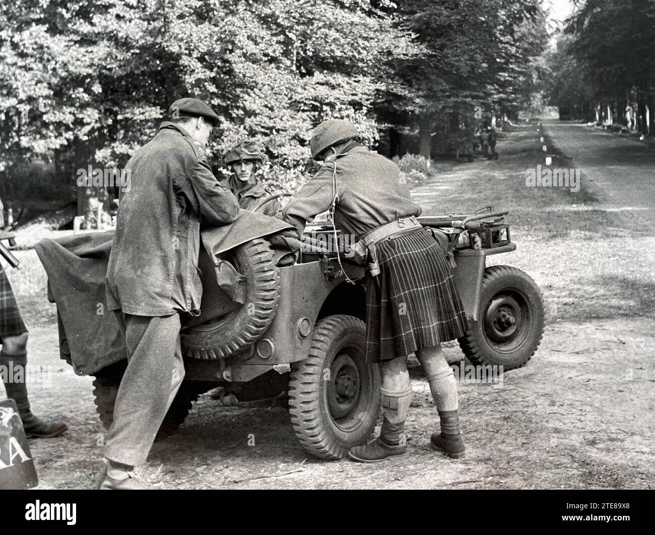 OPERATION MARKET GARDEN September 1944. A local civilian gives advice ...