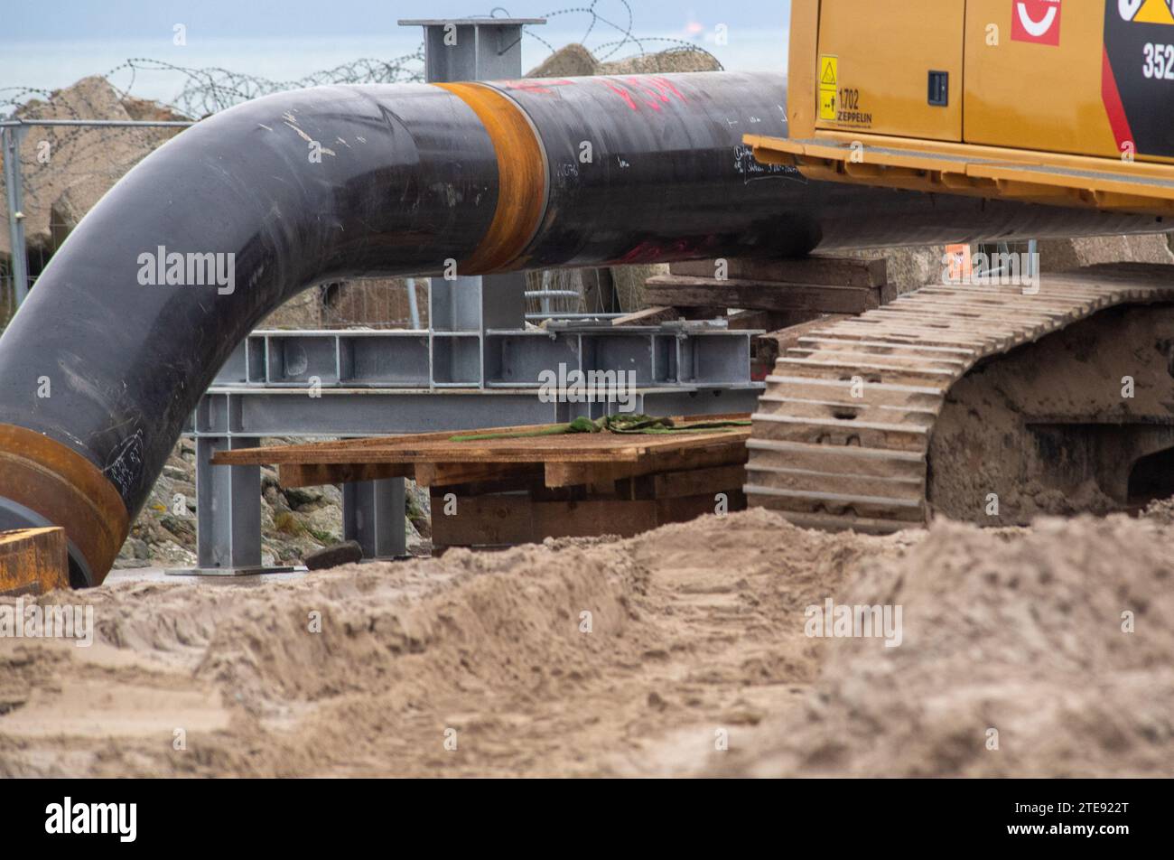 Sassnitz Mukran, Germany. 18th Dec, 2023. Large pipes lie on the ...