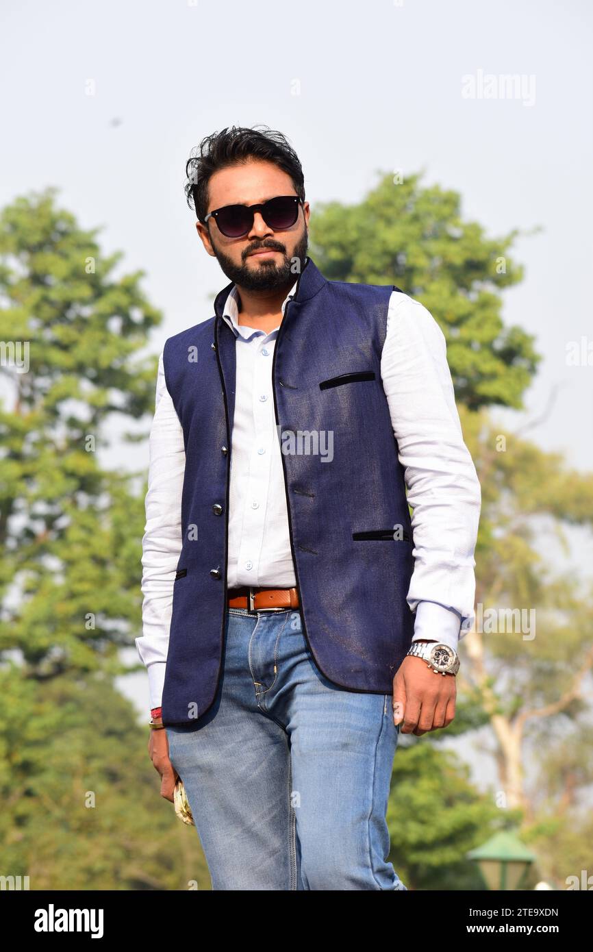 Trendy Young Indian Male Poses Confidently in Stylish Black Sunglasses ...