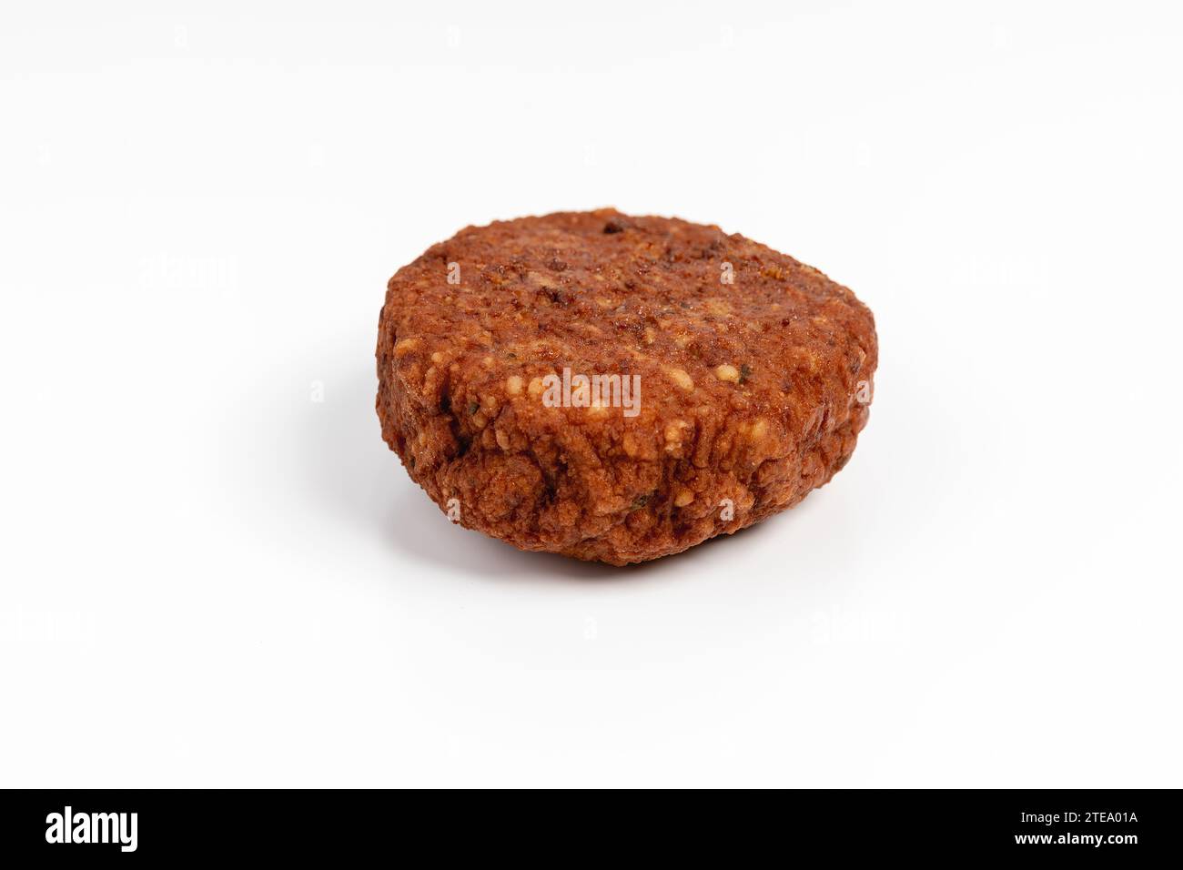 Frikadelle on white background, a rounded, flat-bottomed, pan-fried ...