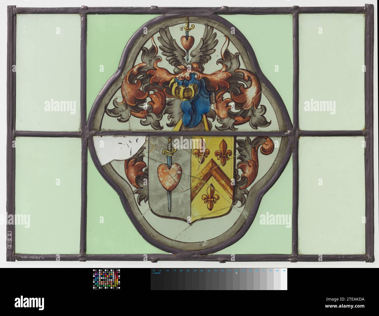 Window with a four -lobe medallion with weapon, pierced a red heart in ...