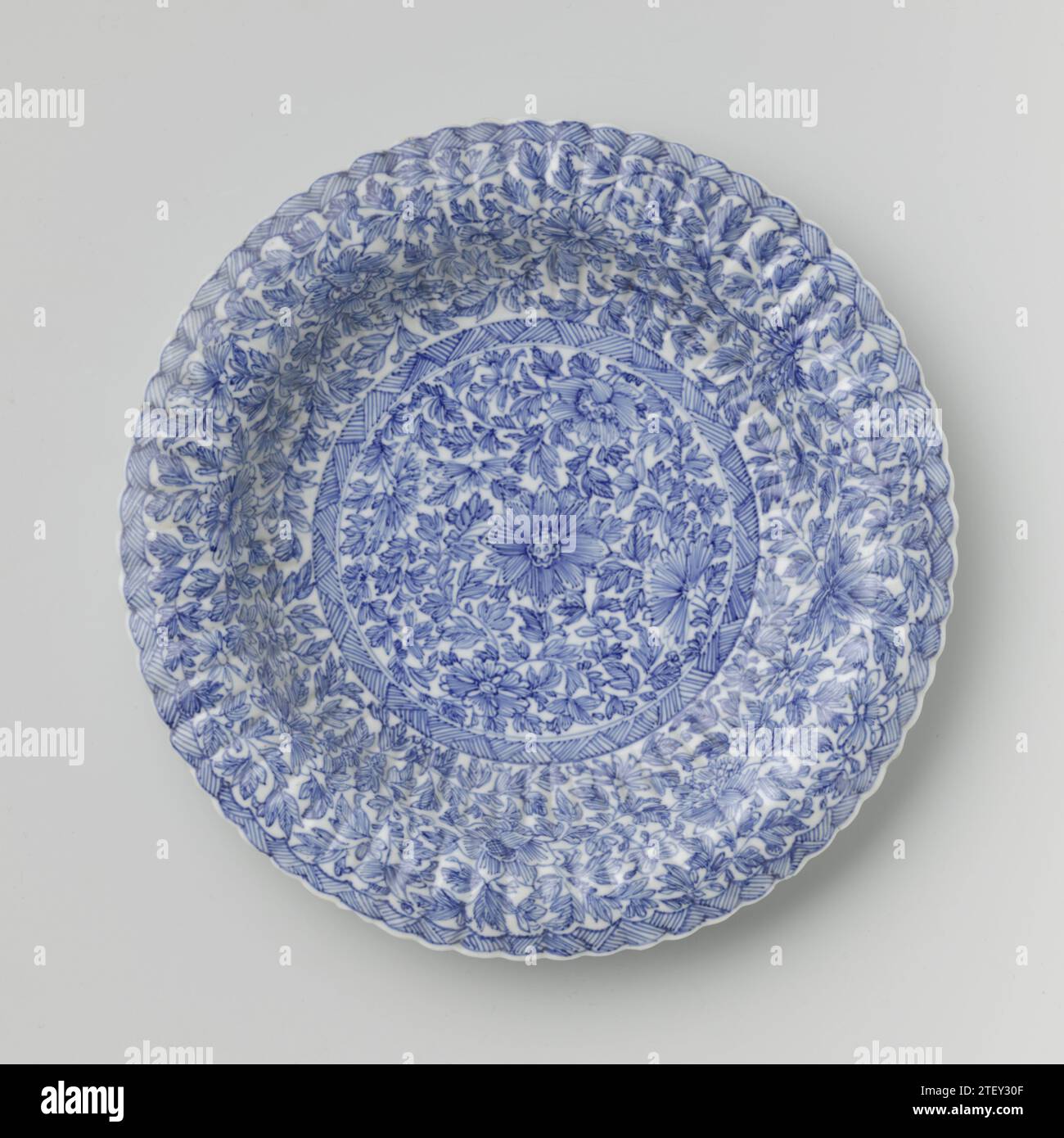 Plate with fluted sides and continuous flower pattern, anonymous, c ...