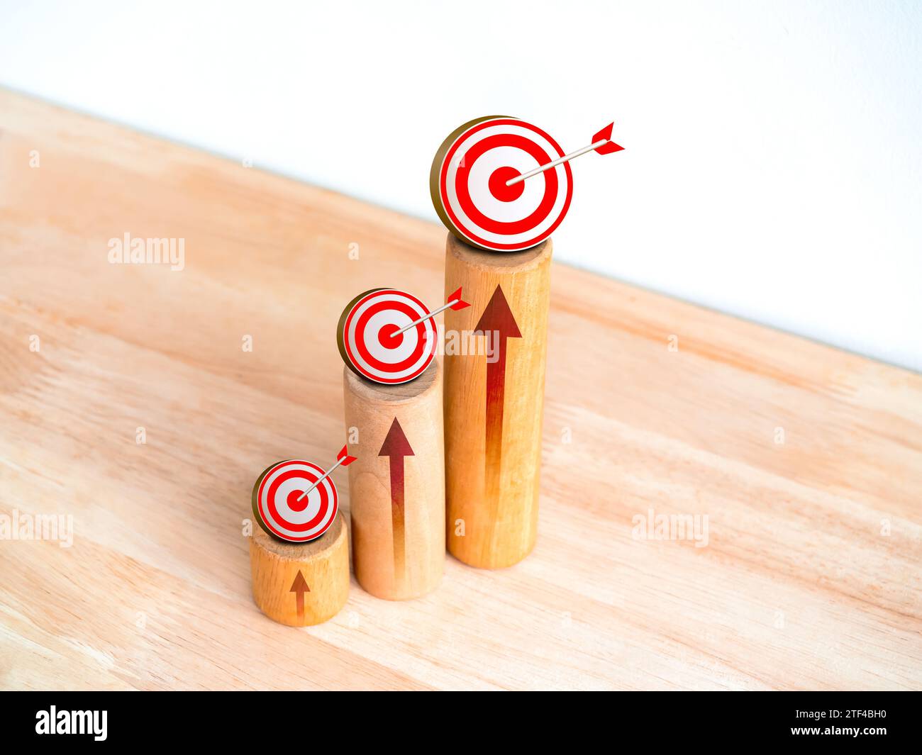 3d Target icons and rise arrows on round wooden sticks as business ...