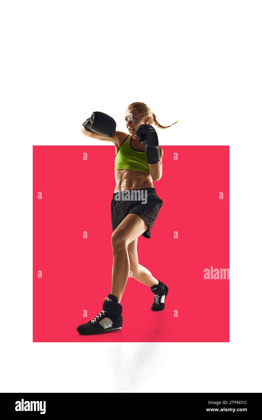 Young muscular woman with fit strong body, boxing athlete in motion ...