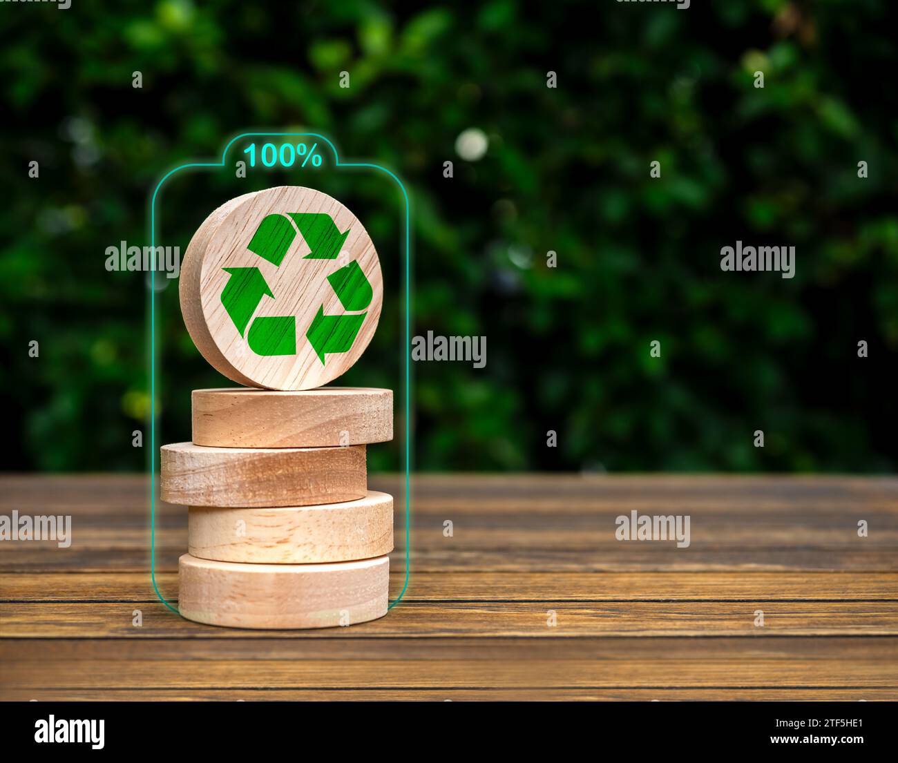 Renewable energy. Green recycle icon on round wooden blocks stack on ...