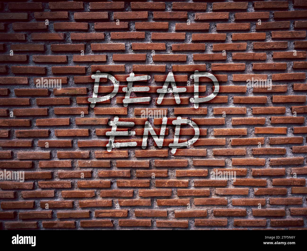 Dead end, no exit way concept. "DEAD END" white text on old red brick ...