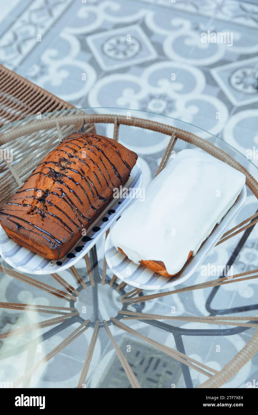 vertical image of marble pudding with chocolate and vanilla glaze ...