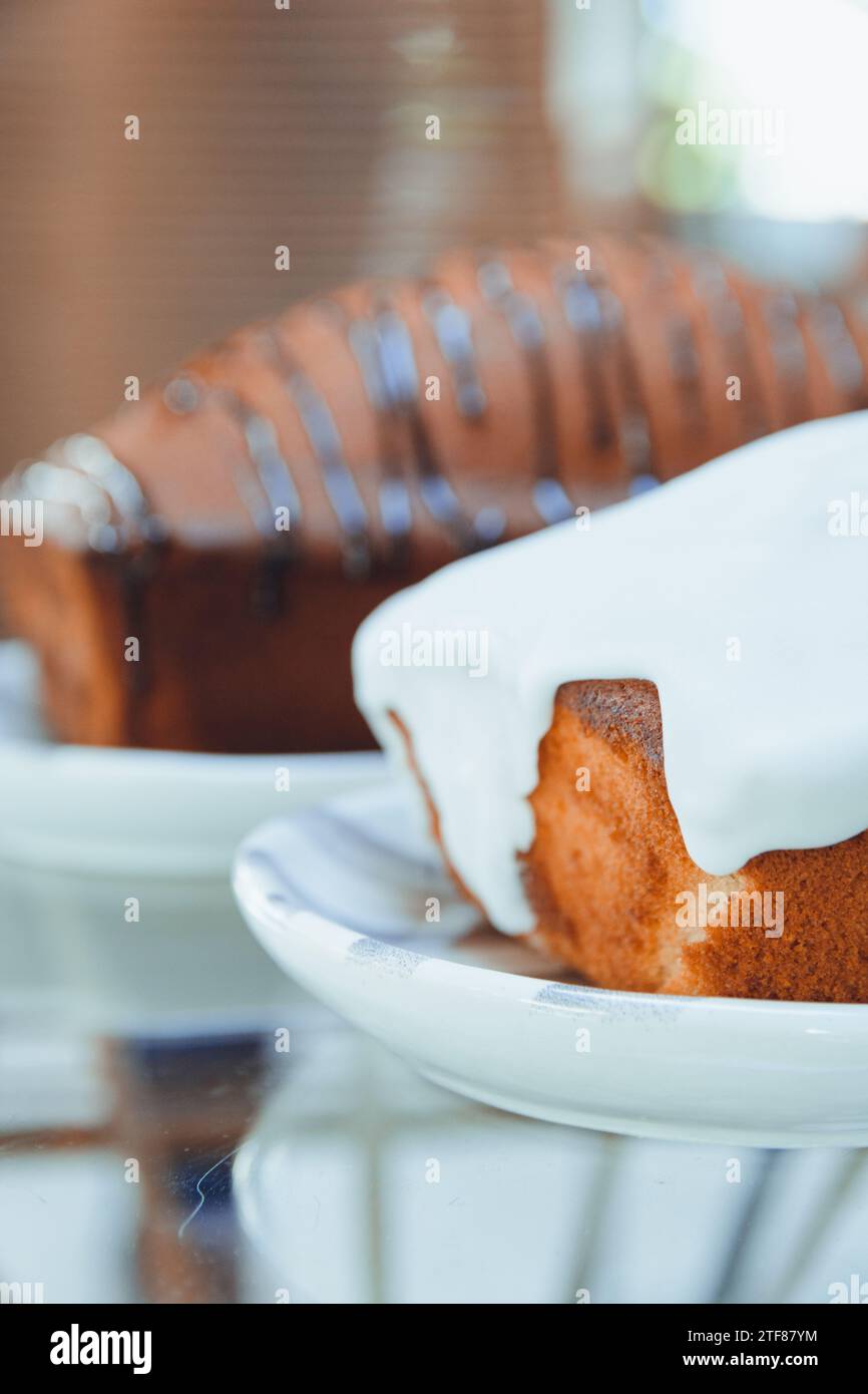 vertical image of marble pudding with chocolate and vanilla glaze ...