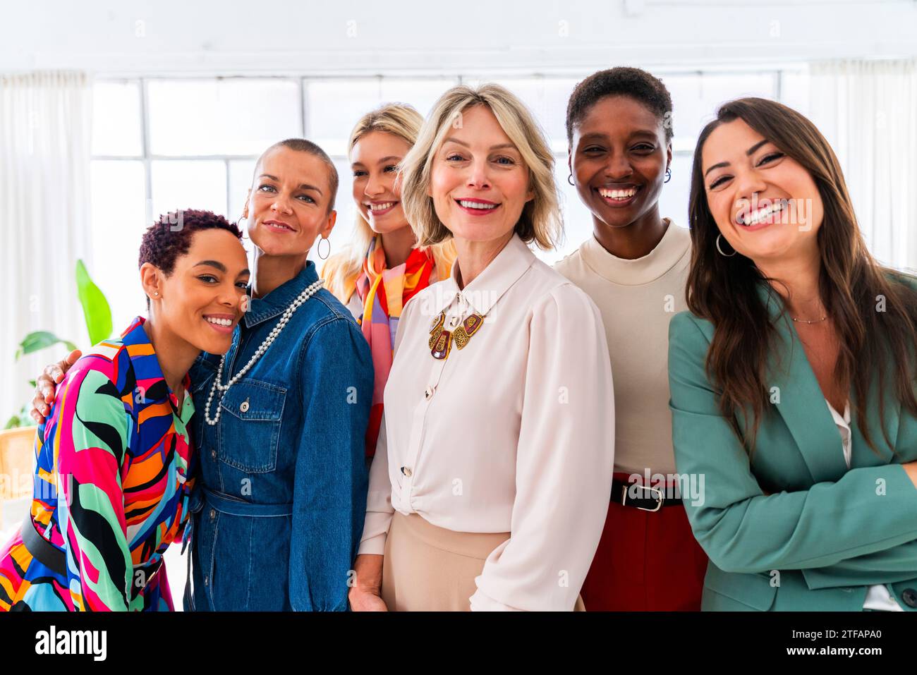 Group of beautiful confident businesswomen meeting in the office ...