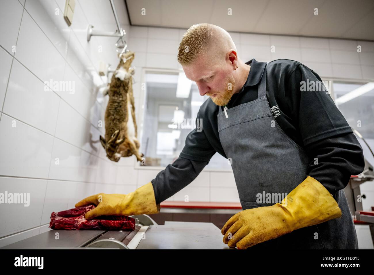 ROTTERDAM - Employees of a poulterer process orders the day before ...