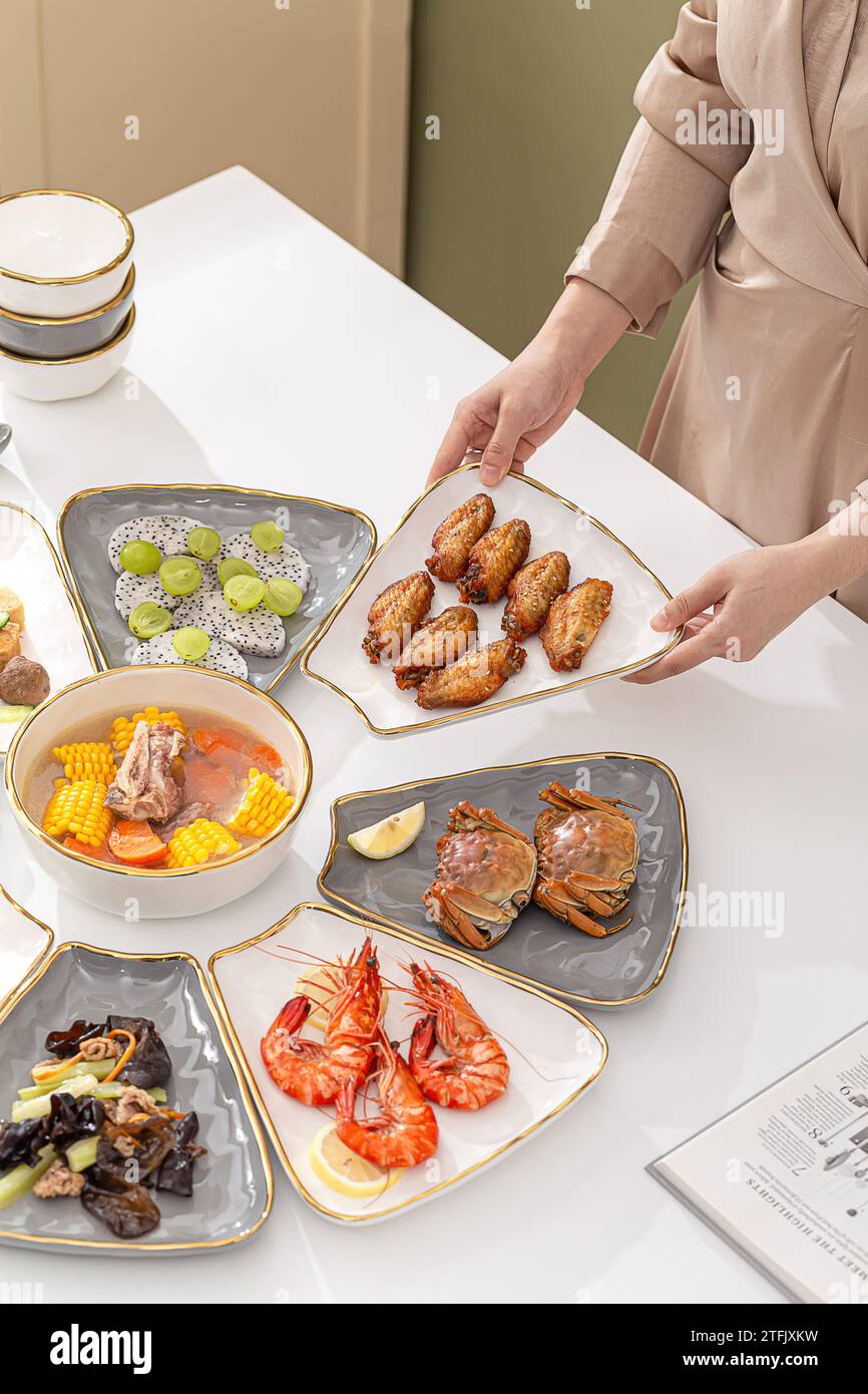 Images of cooking at home, preparing dinner, Asian food on the table ...
