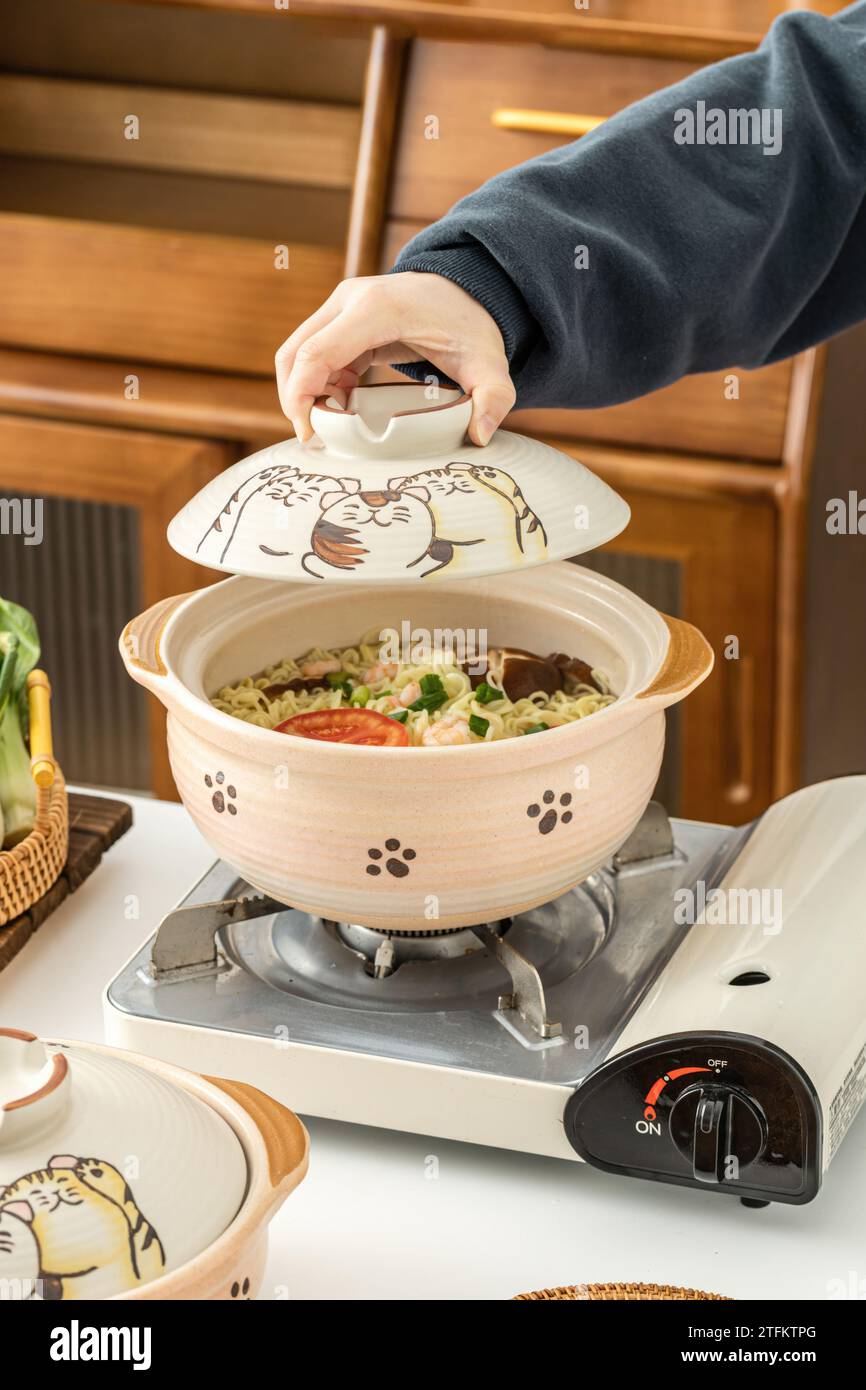 Images of cooking at home, preparing dinner, Asian food on the table ...