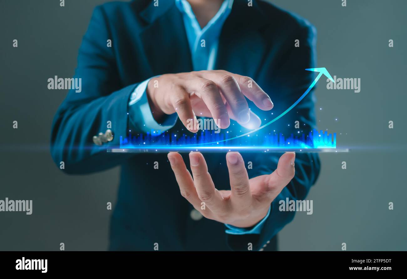 Business development concepts for success and growth. Businessman taps ...