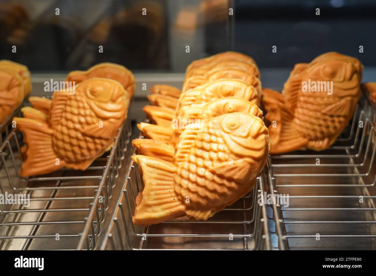 Waffle taiyaki fish pastries on display at a coffee shop Stock Photo ...