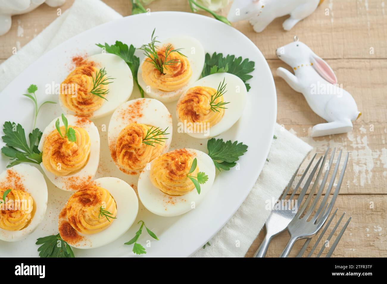 Easter stuffed eggs. Traditional Easter brunch or dinner with stuffed ...