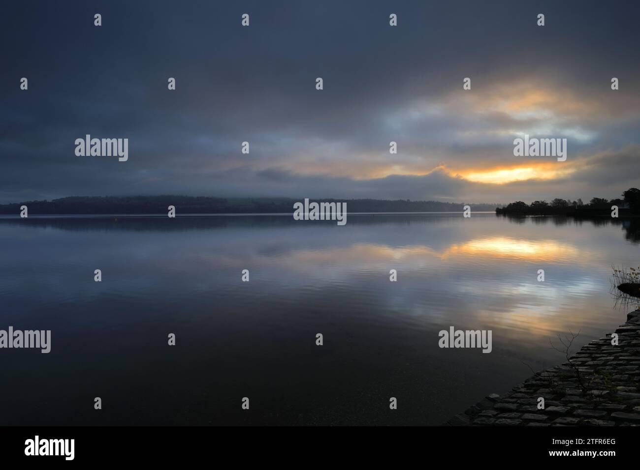 A misty dawn over Loch Lomond from Duck Bay, Balloch village, West ...