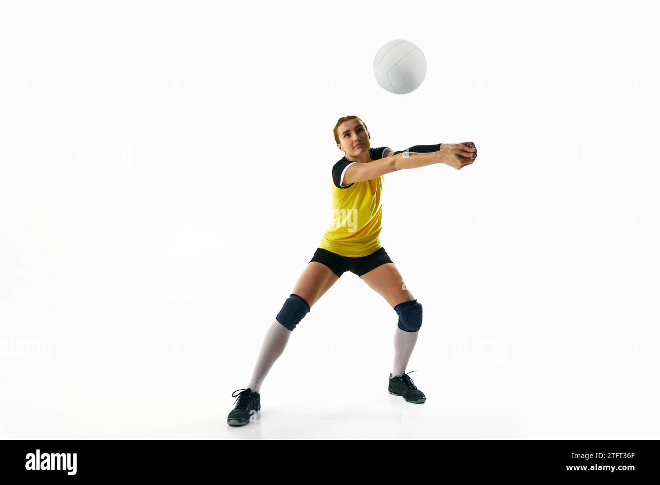 Dynamic competitive young woman, volleyball player in motion during ...