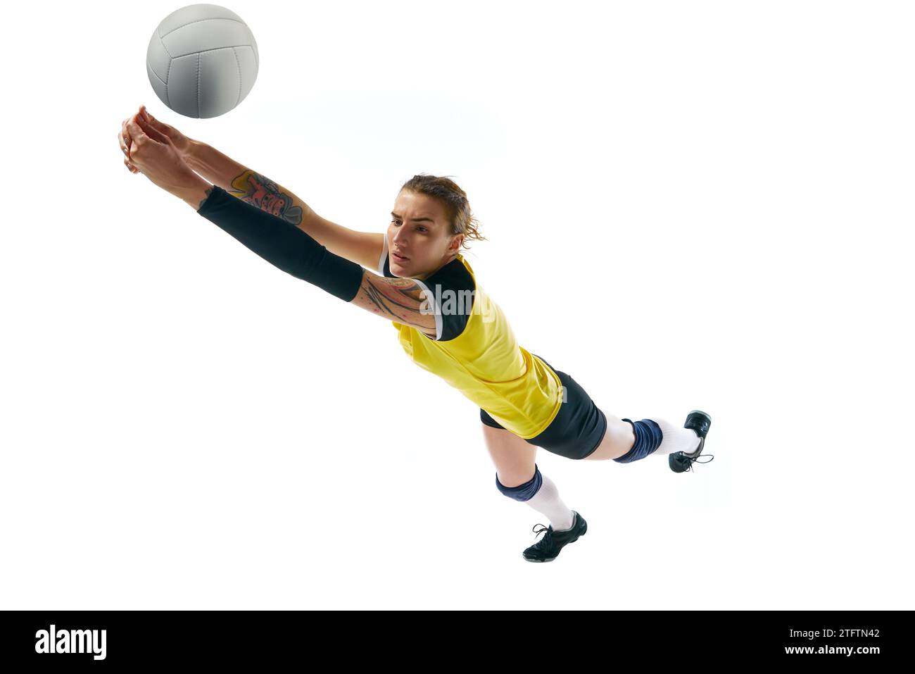 Dynamic competitive young woman, volleyball player in motion during ...