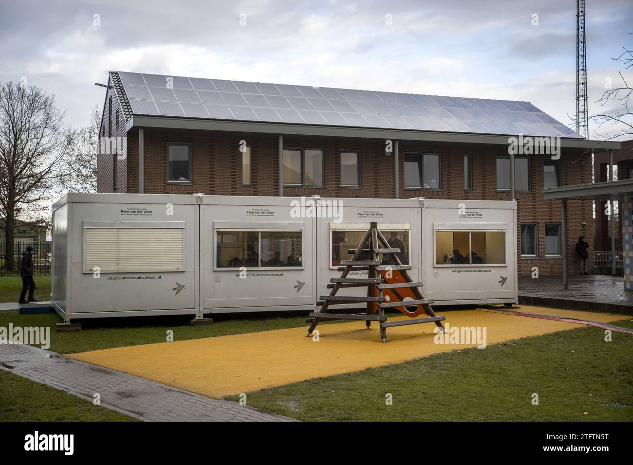 TER APEL - Asylum seekers wait in a reception area in a mobile ...
