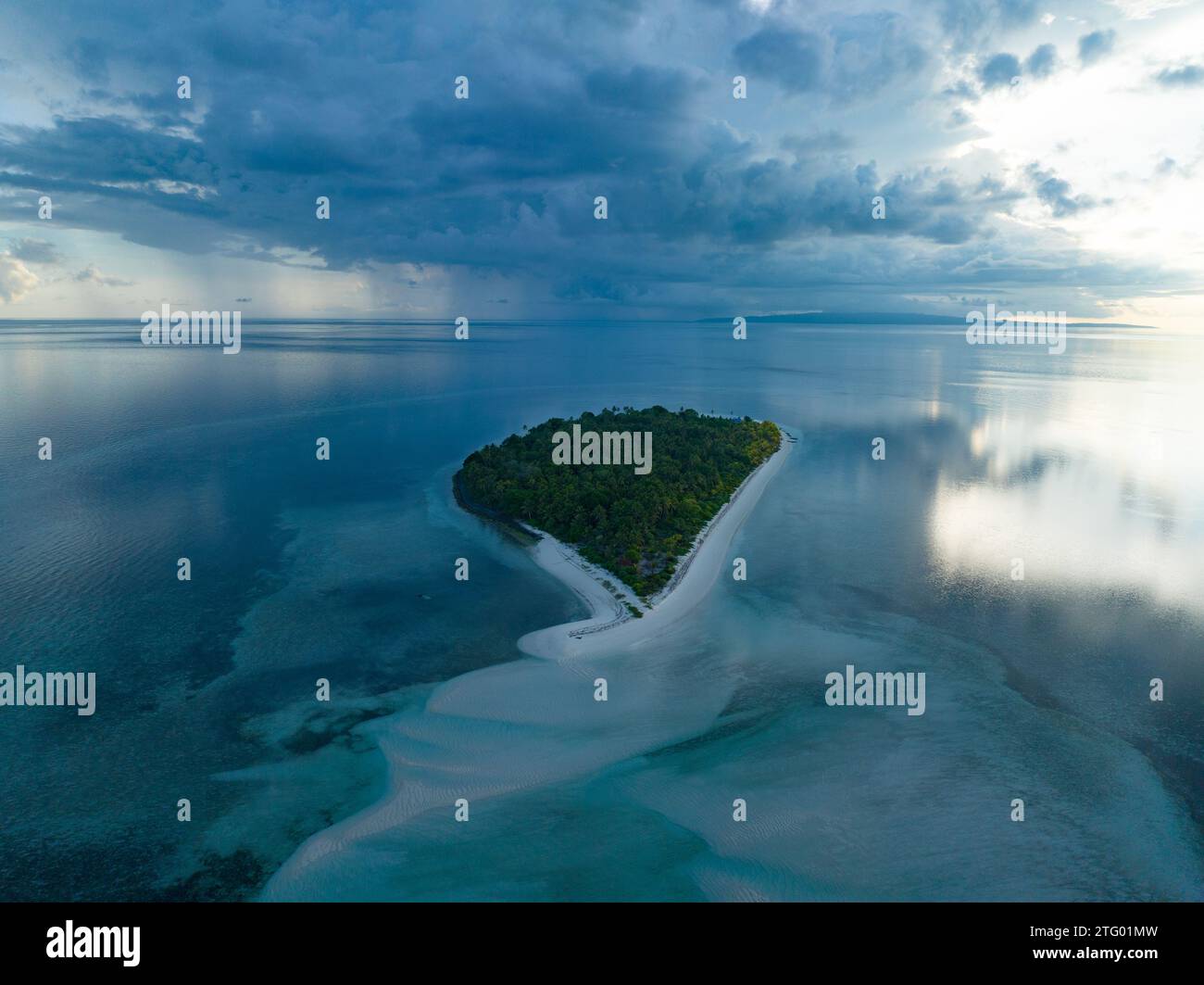 Morning light illuminates the island of Koon in Indonesia. This island ...