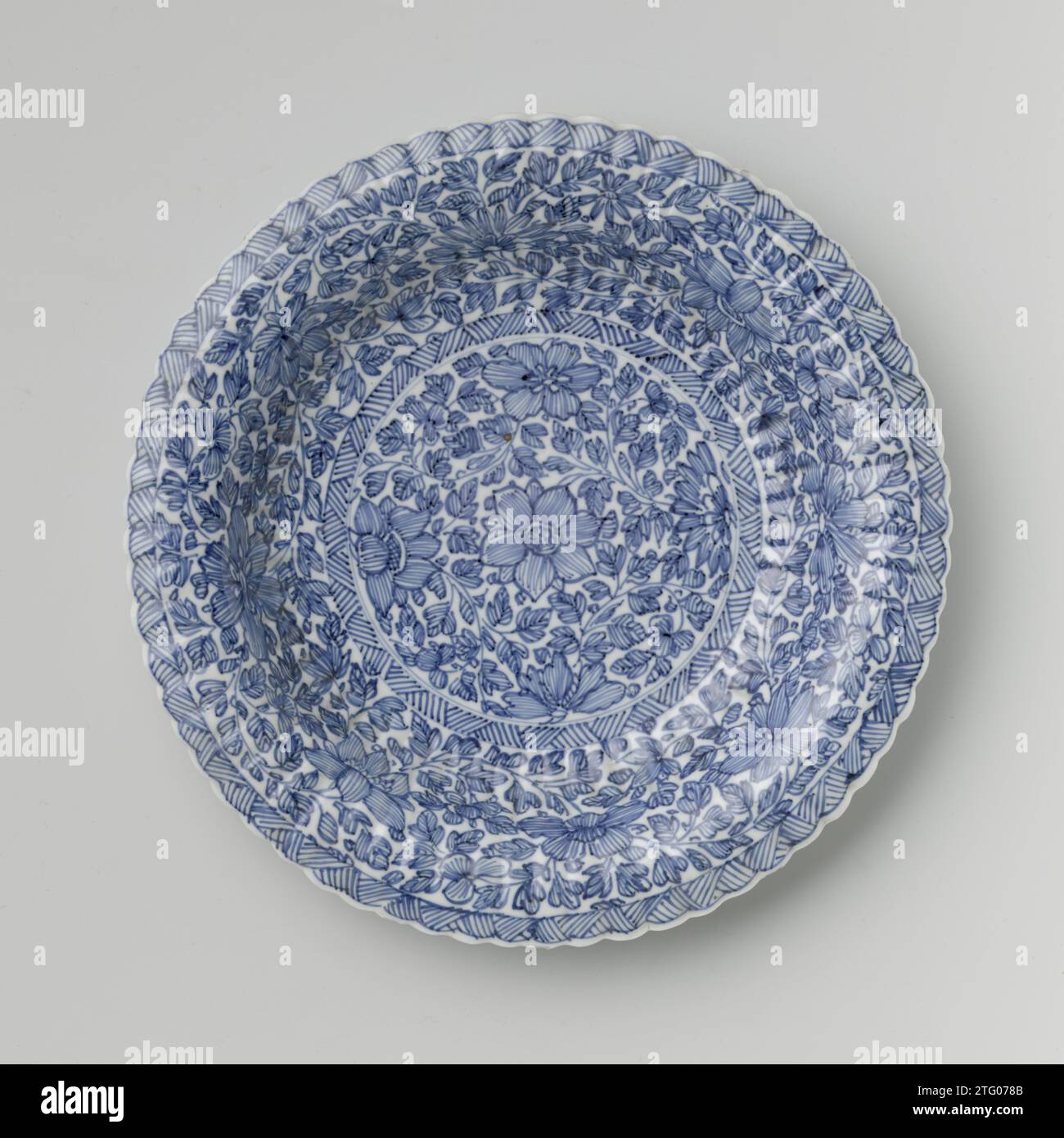 Plate with fluted sides and continuous flower pattern, anonymous, c ...