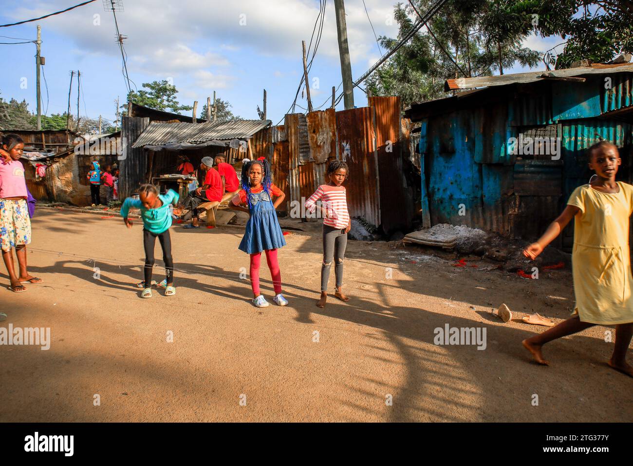 Kids playing outside the streets in Kibera Slum, Nairobi. A view ...