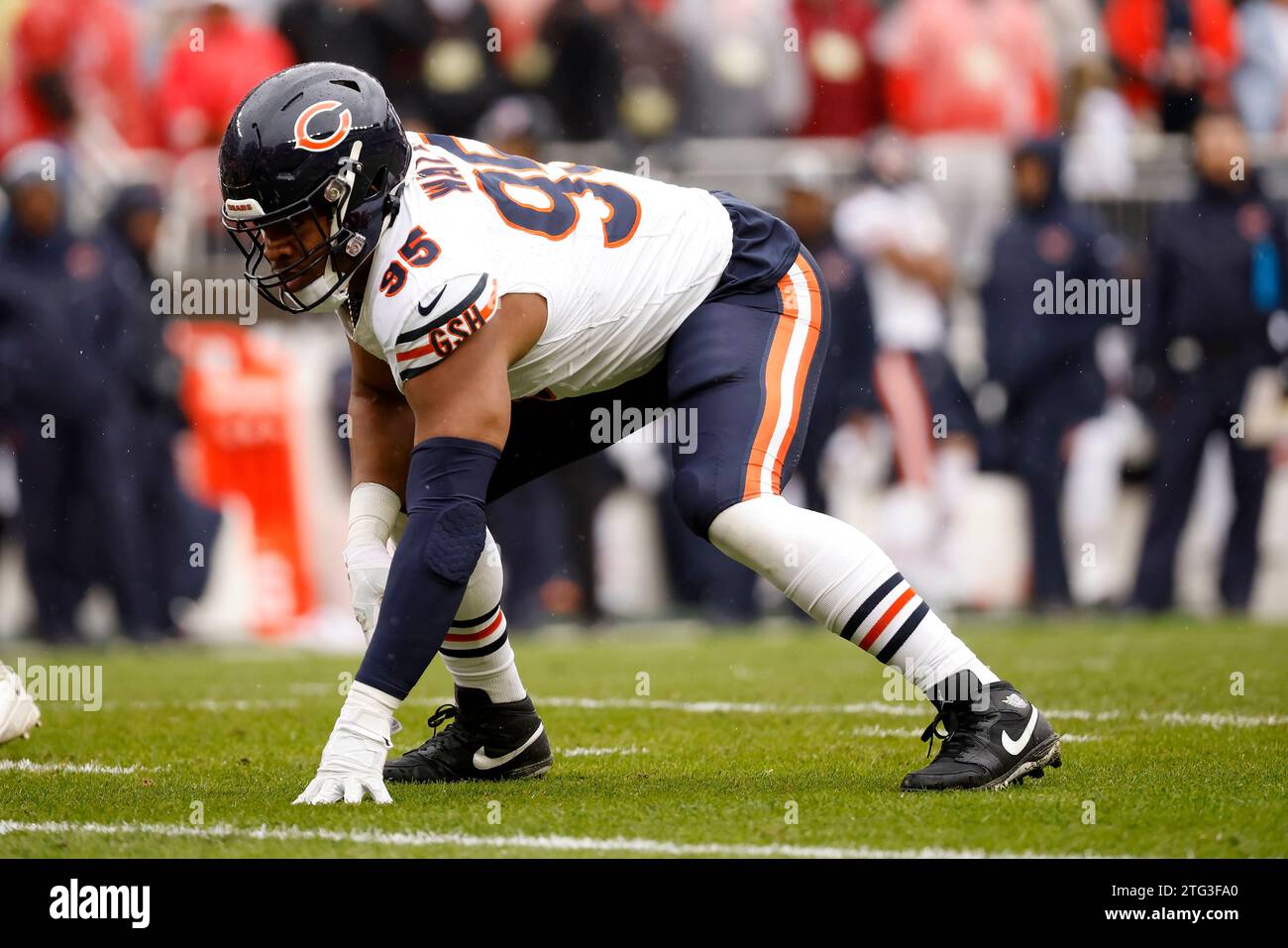 Chicago Bears defensive lineman DeMarcus Walker (95) lines up for a ...