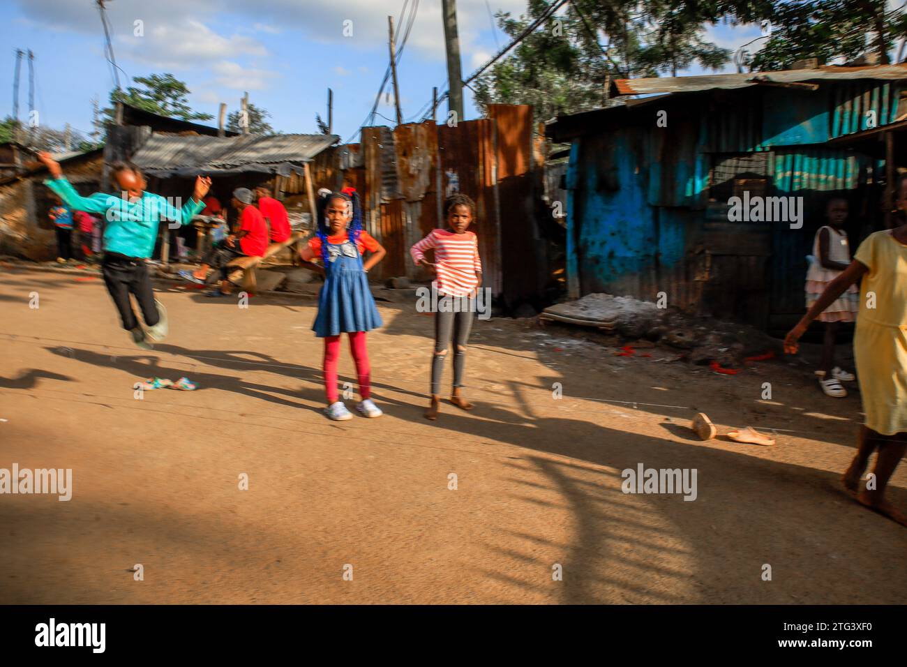 Kids playing outside the streets in Kibera Slum, Nairobi. A view ...
