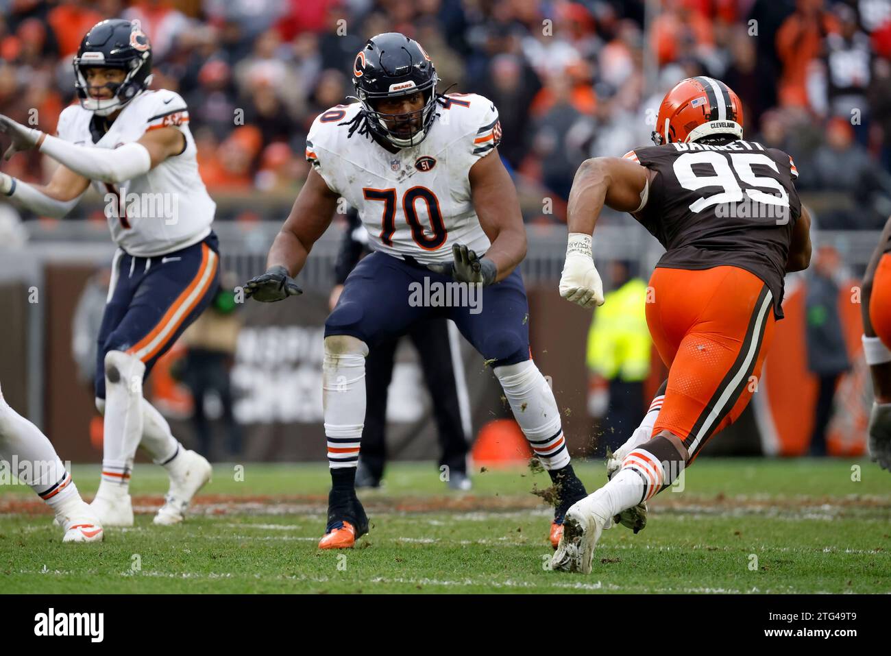 Chicago Bears offensive lineman Braxton Jones (70) looks to block Cleveland Browns defensive end ...